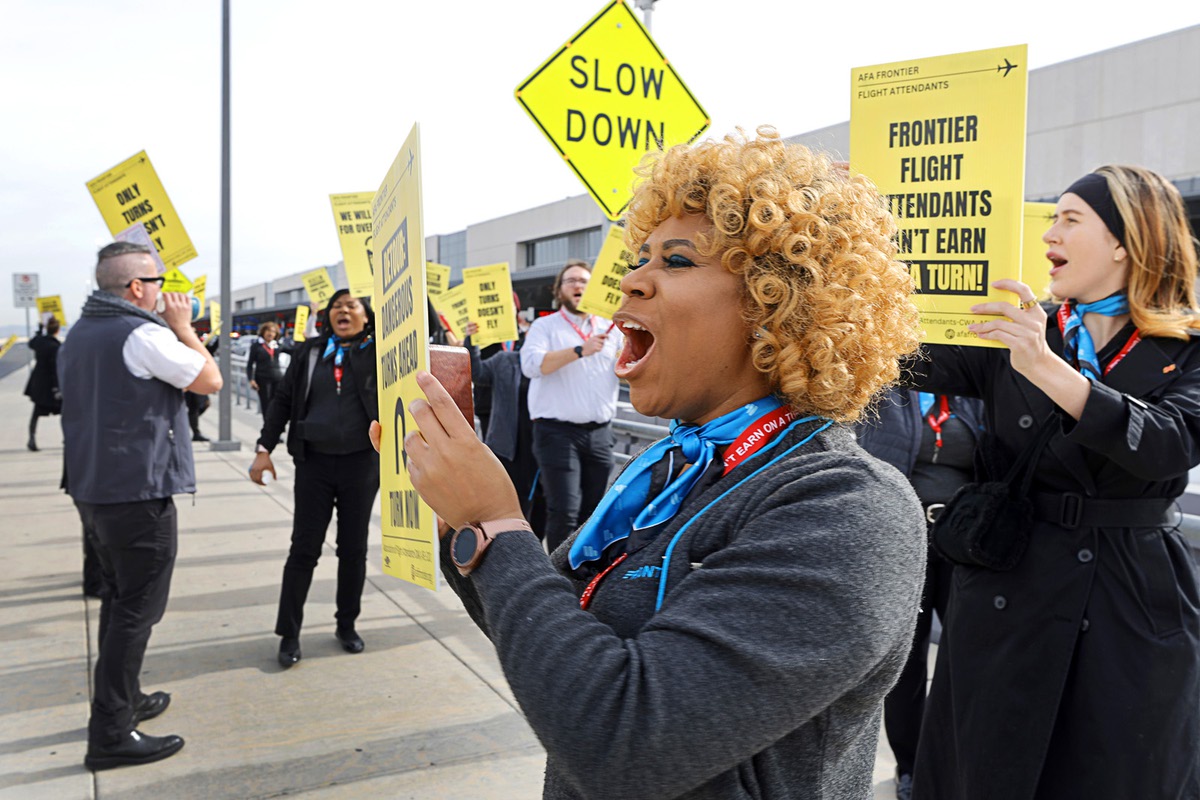 Frontier Airlines flight attendants picket over flight schedules, pay ...